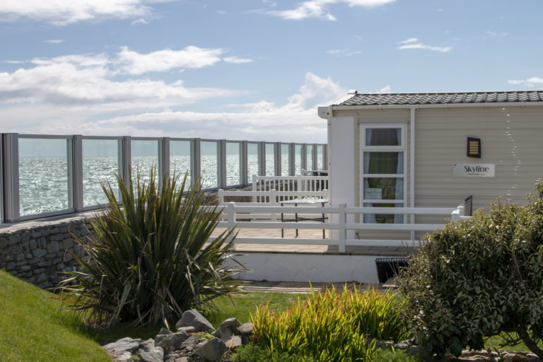New glass sea defence wall for Welsh holiday park gets the thumbs up ...